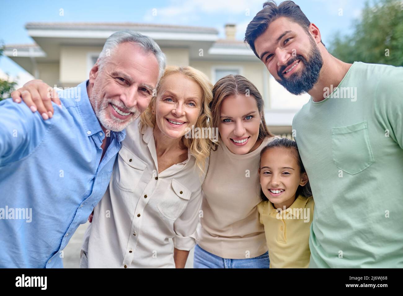 A smiling and happy family together Stock Photo - Alamy
