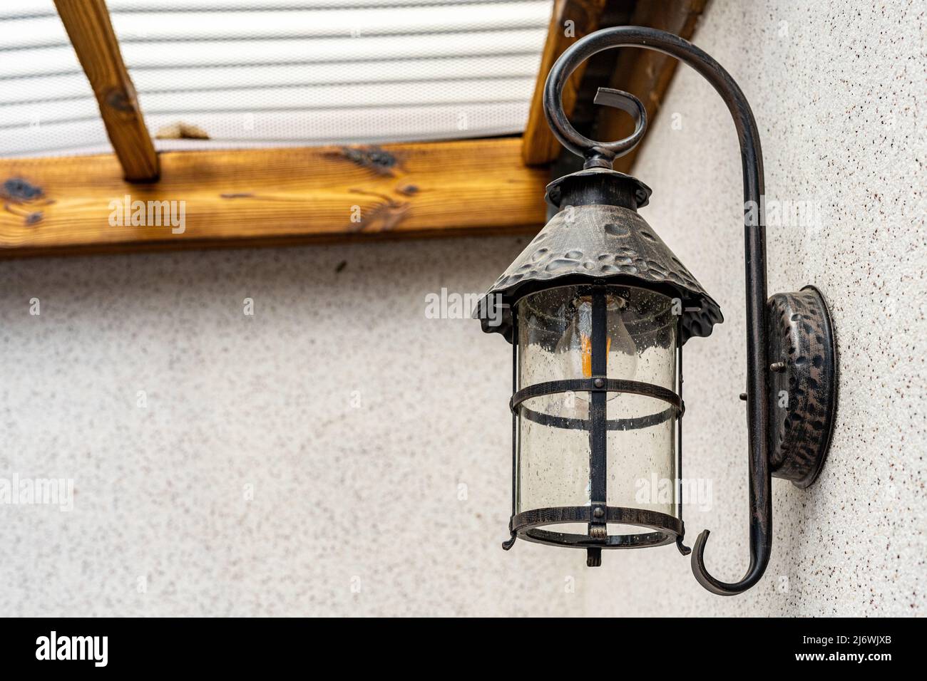 Lamp in vintage style. The lamp is attached to the wall. The lamp is ...