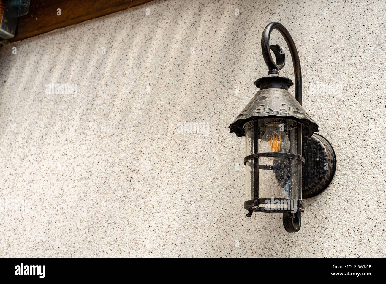 Lamp in vintage style. The lamp is attached to the wall. The lamp is ...