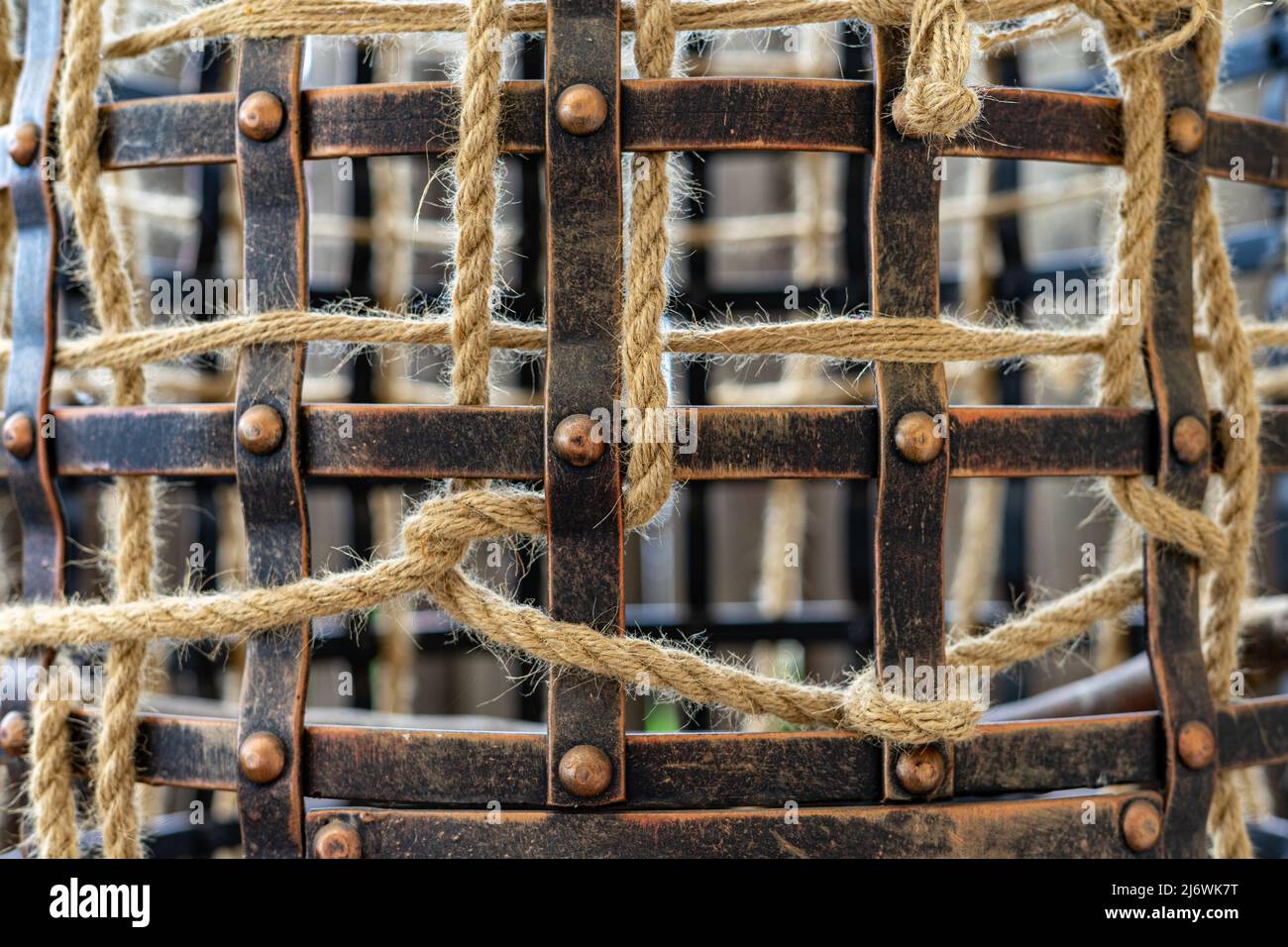 The designer bird cage is made in the old style. The iron cage is ...