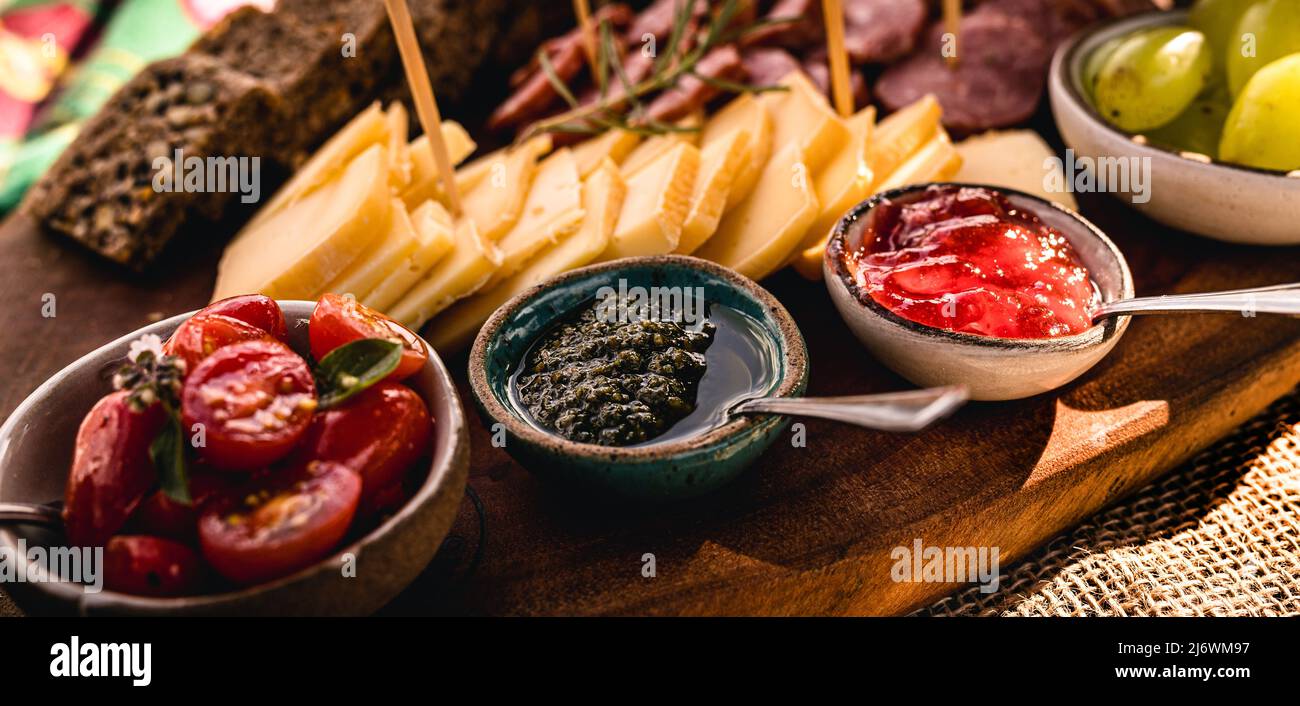 cold cuts, snacks and garnish, with artisanal Parmesan cheese, fresh ...