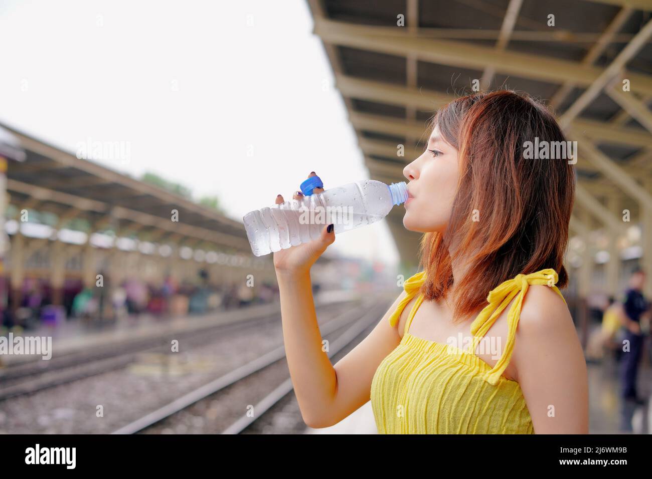 asian young girl drink water Stock Photo - Alamy