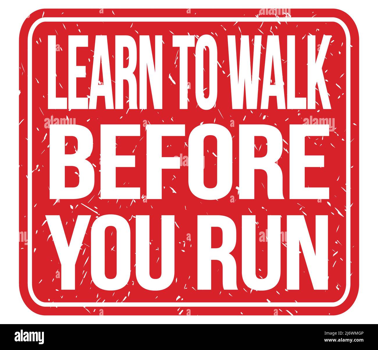 LEARN TO WALK BEFORE YOU RUN, text written on red stamp sign Stock ...