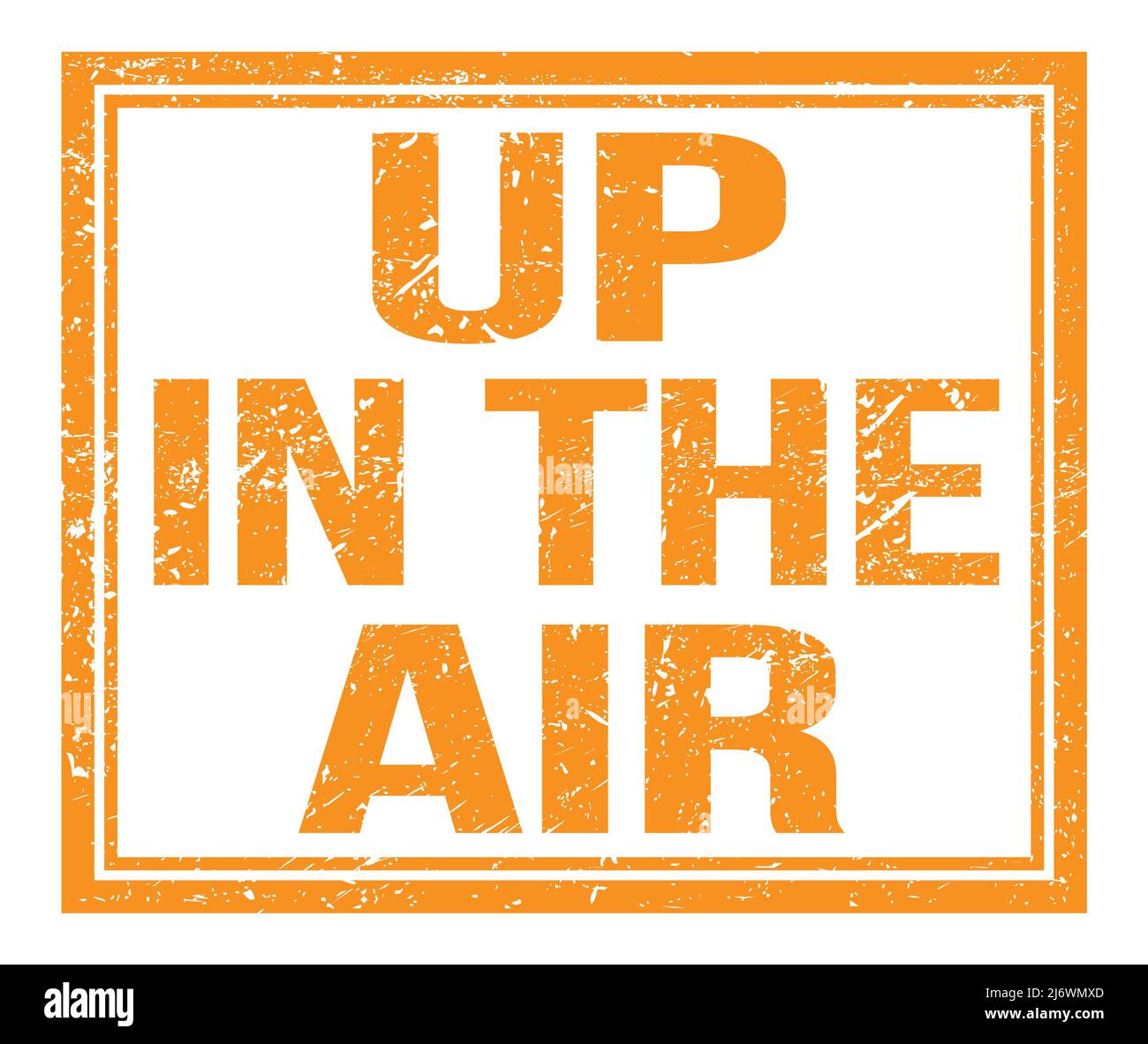 UP IN THE AIR, written on orange grungy stamp sign Stock Photo - Alamy