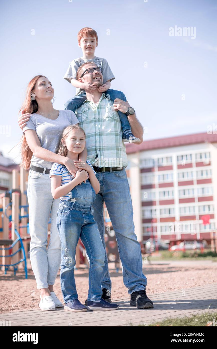 in full growth.happy family with children standing together Stock Photo ...