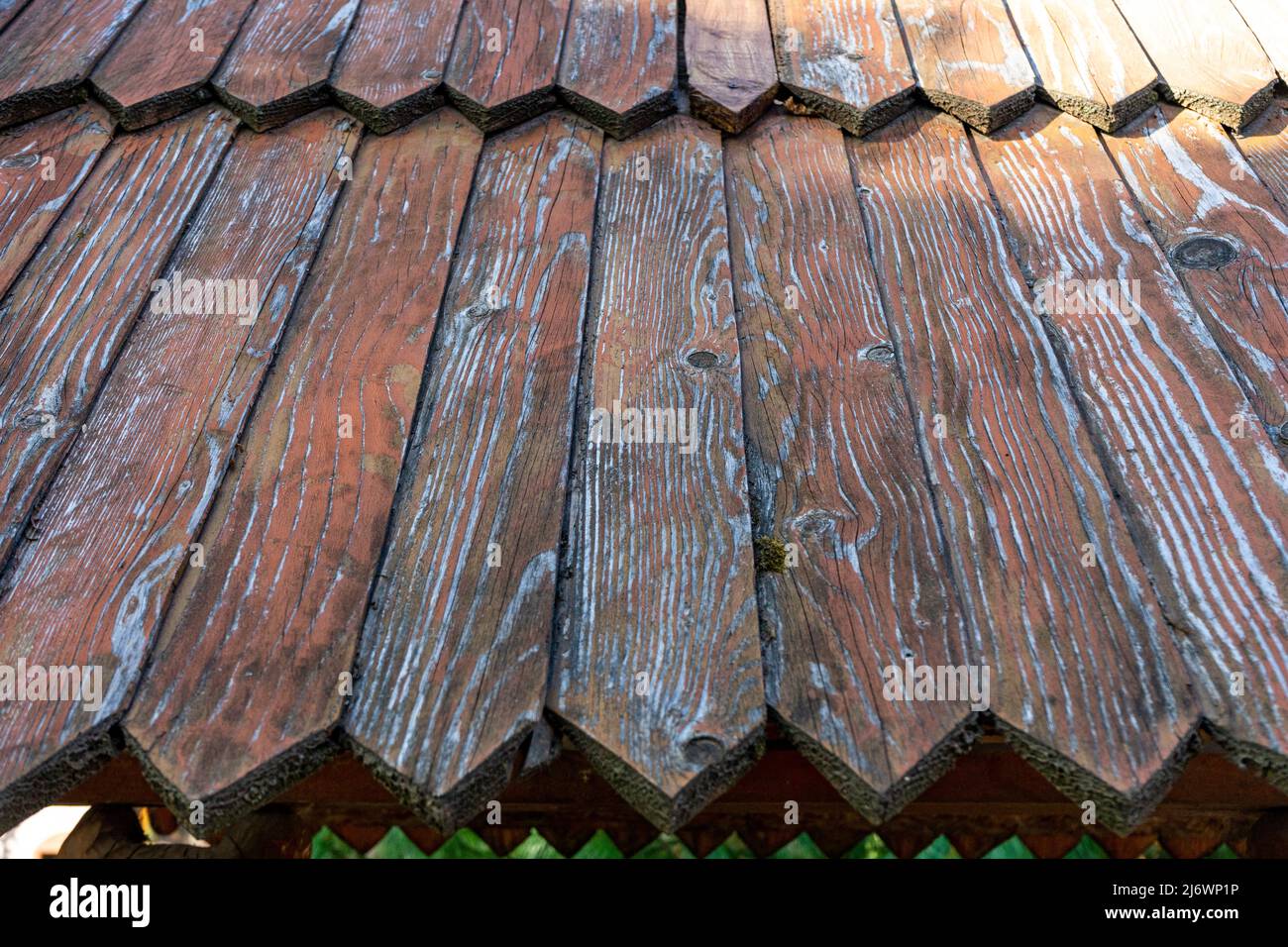 Wooden roof with peeling paint. Ancient roofing technology Stock Photo ...