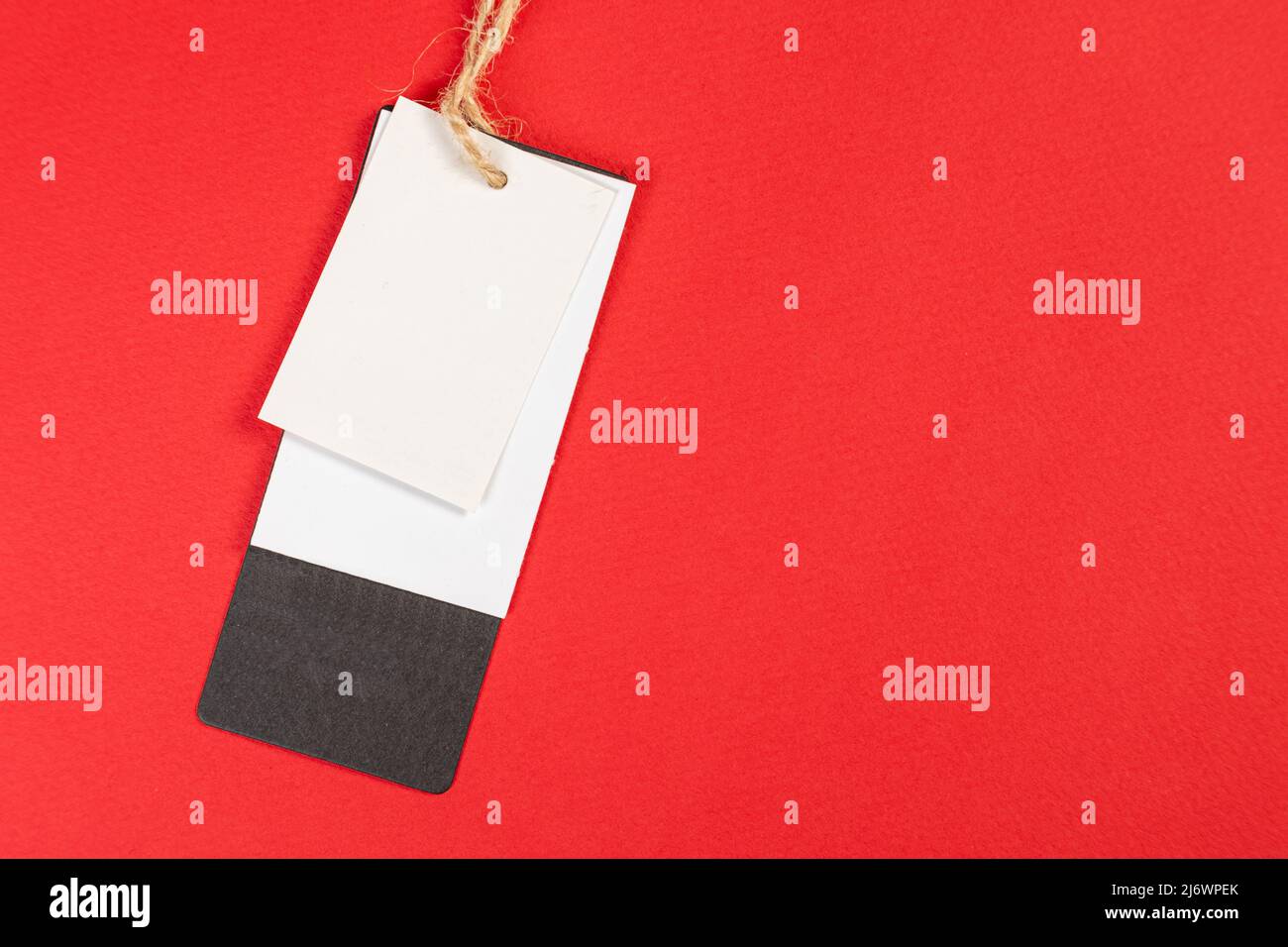 white price tag on a red background, price tag for goods Stock Photo ...