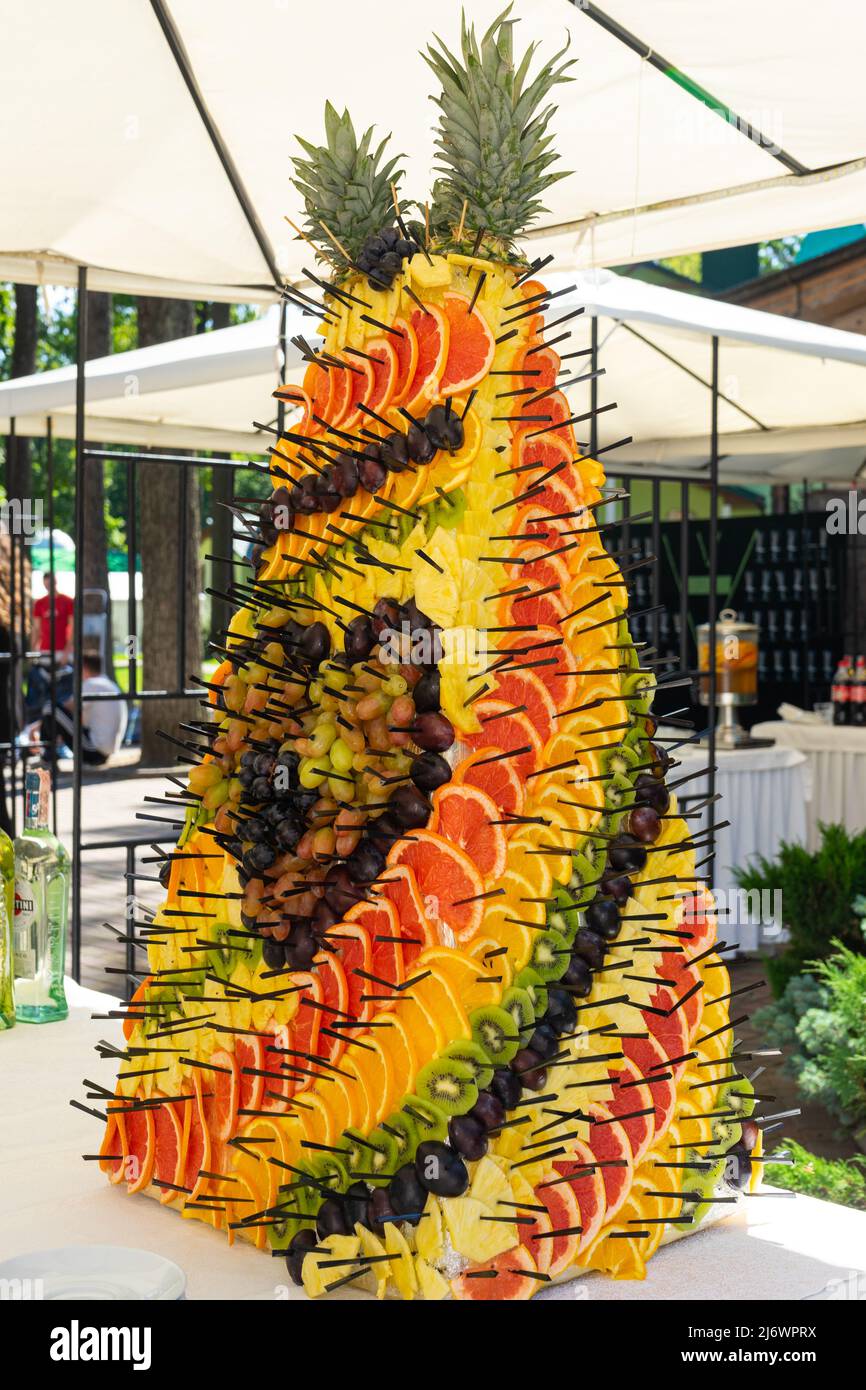 Original fruit slicing. Fruit composition. Buffet table Stock Photo - Alamy