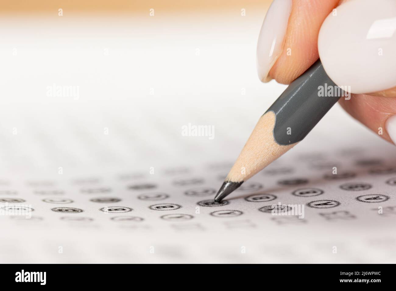 hand fill in Exam carbon paper computer sheet and pencil Stock Photo ...
