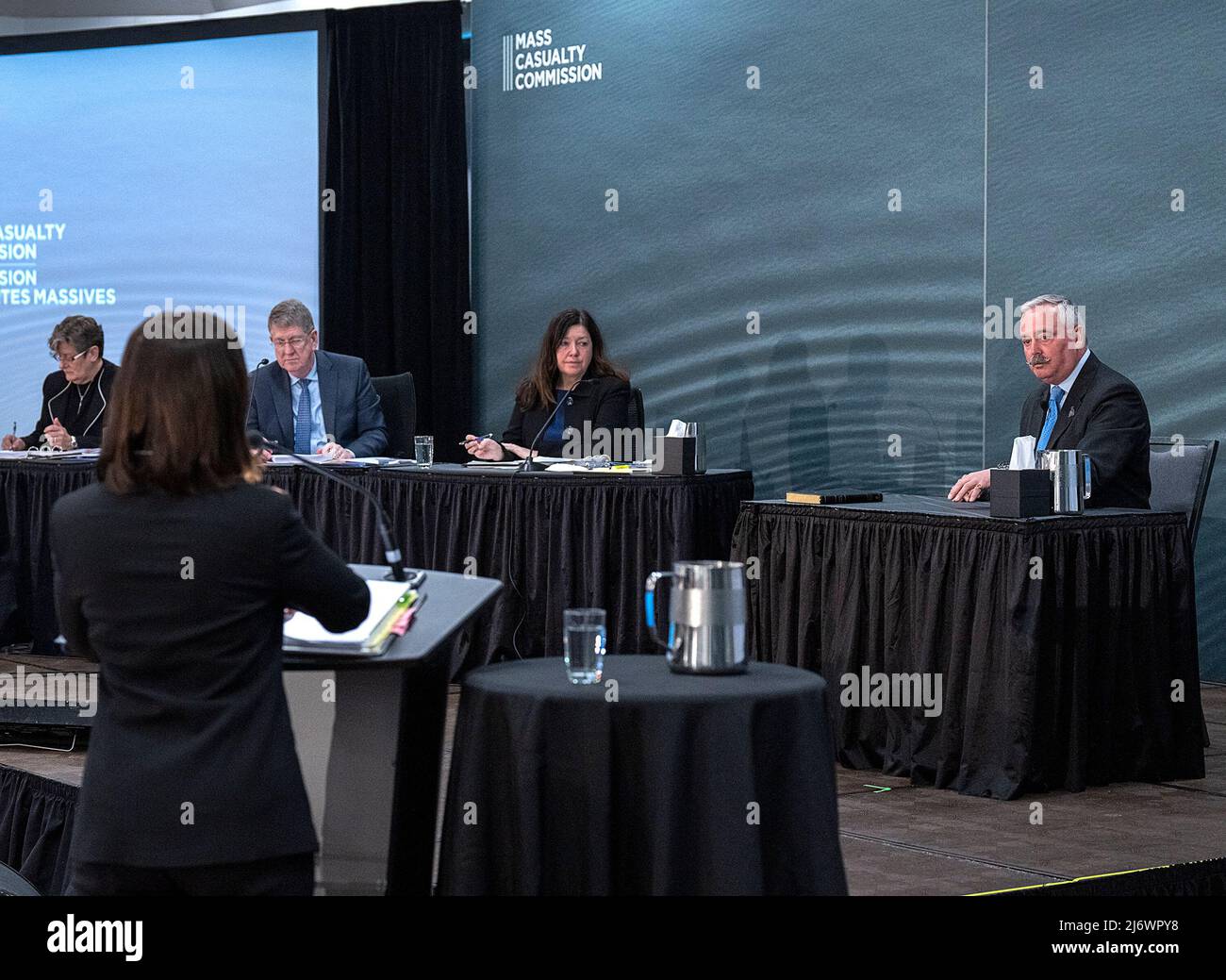Senior commission counsel Rachel Young, left, questions Al McCambridge ...