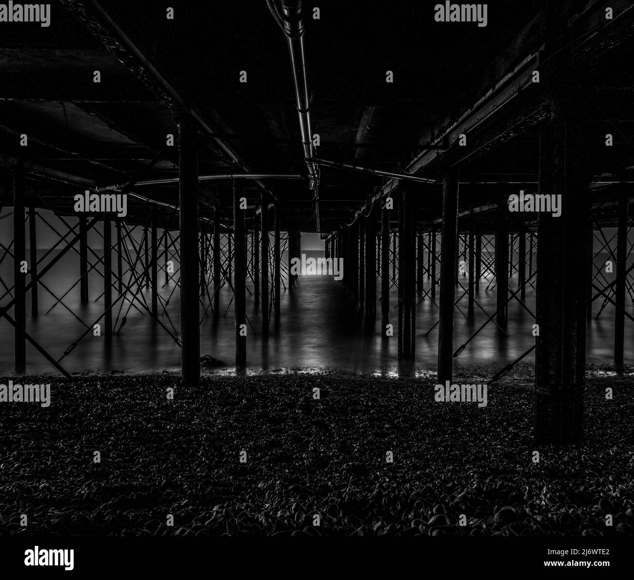 Legs pier Black and White Stock Photos & Images - Alamy