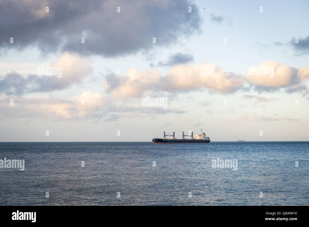 Container ship floating in sea hi-res stock photography and images - Alamy