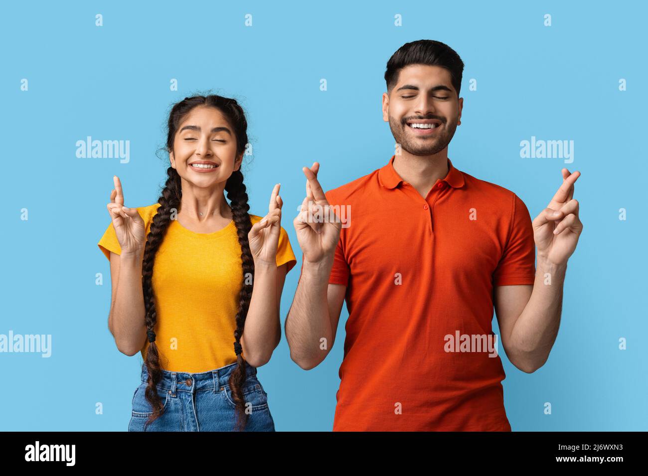 Fingers crossed and couple hi-res stock photography and images - Alamy