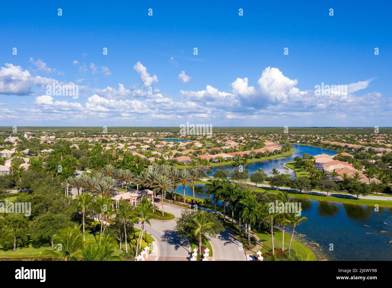 Verona Walk Naples aerial drone image with entry gate and some housing ...