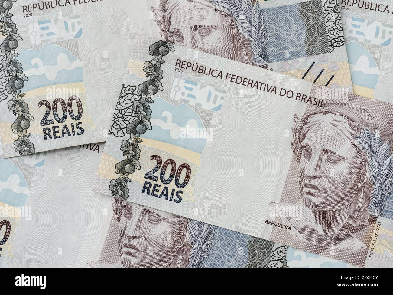 A groud of two hundred brazilian real bills spread Stock Photo - Alamy