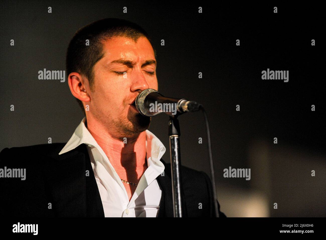 Alex Turner, lead singer of the Arctic Monkeys performs a hometown show ...