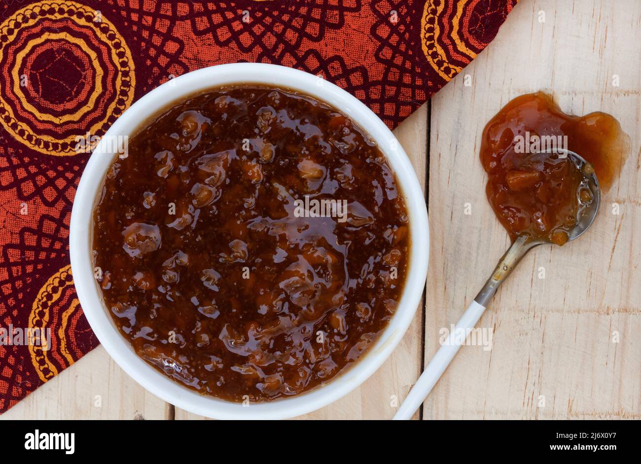 Traditional South African fruit chutney, a popular condiment in a white ...