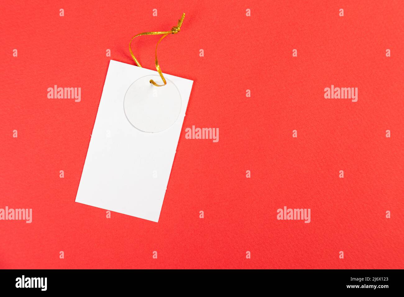white price tag on a red background, price tag for goods Stock Photo ...