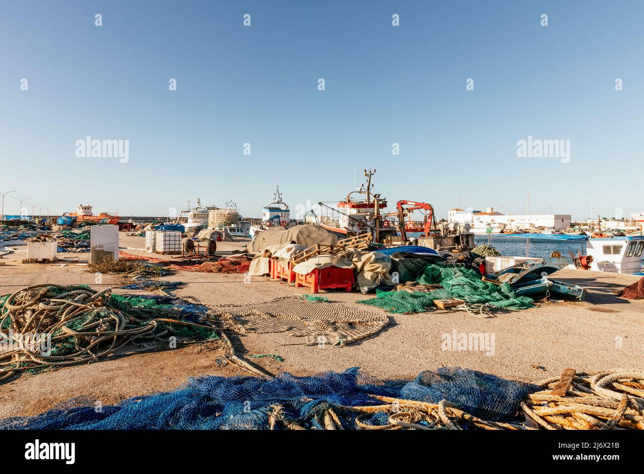 mooring in the port of motril with ropes and fishing boats, granada ...