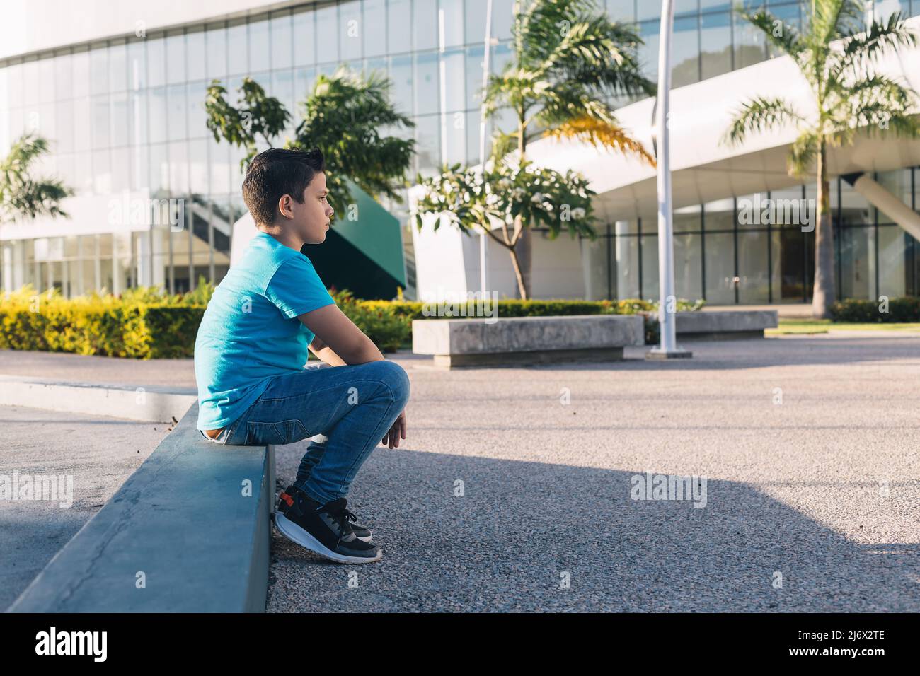 teenager sitting thinking about life, meditate in surroundings Stock ...
