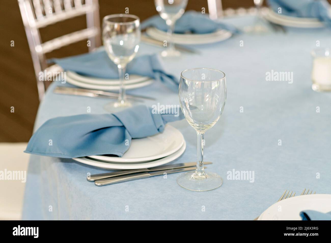 Table setting for holidays and wedding, blue color. A set table for a ...