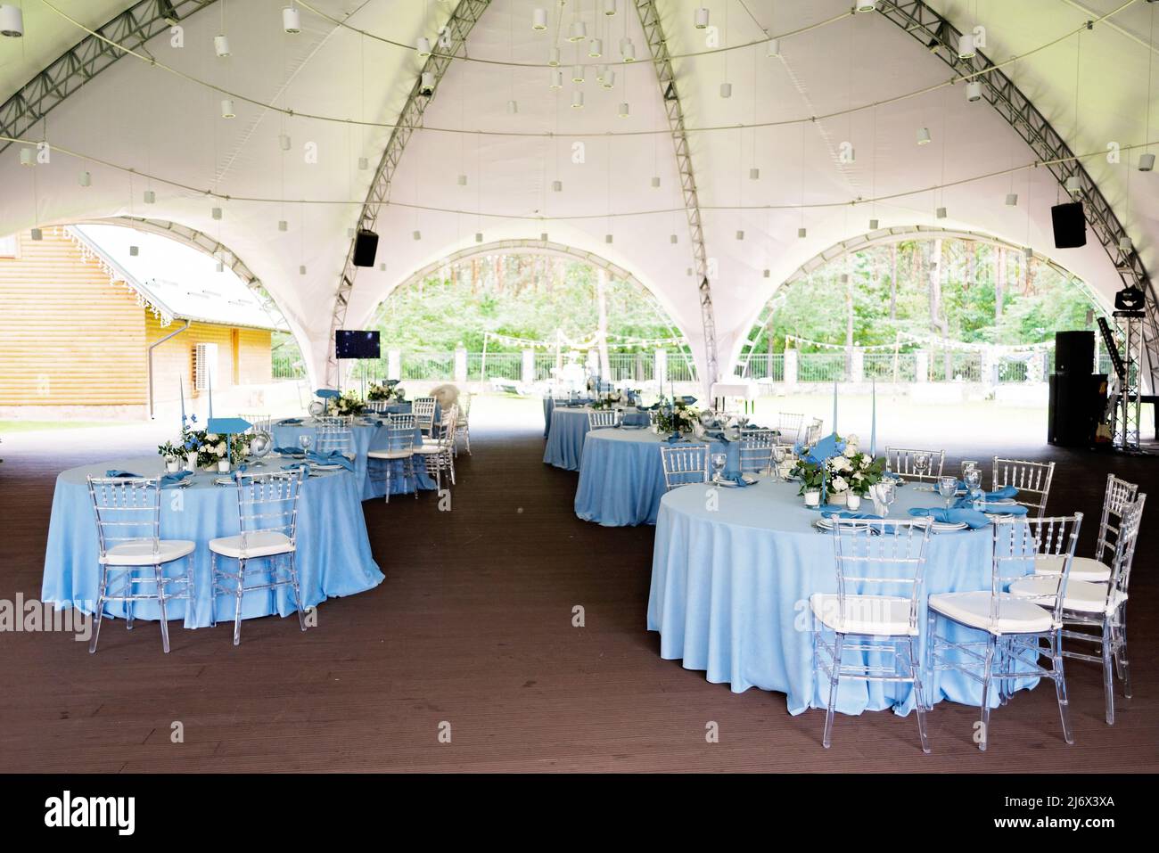 Banquet hall, tables decorated with flowers for holidays and weddings ...