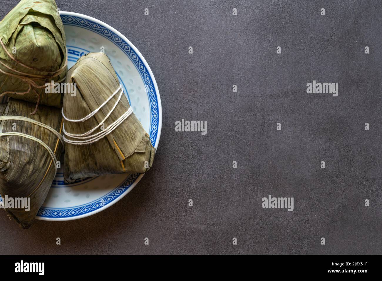Glutinous rice dumplings on a chinese plate hi-res stock photography ...