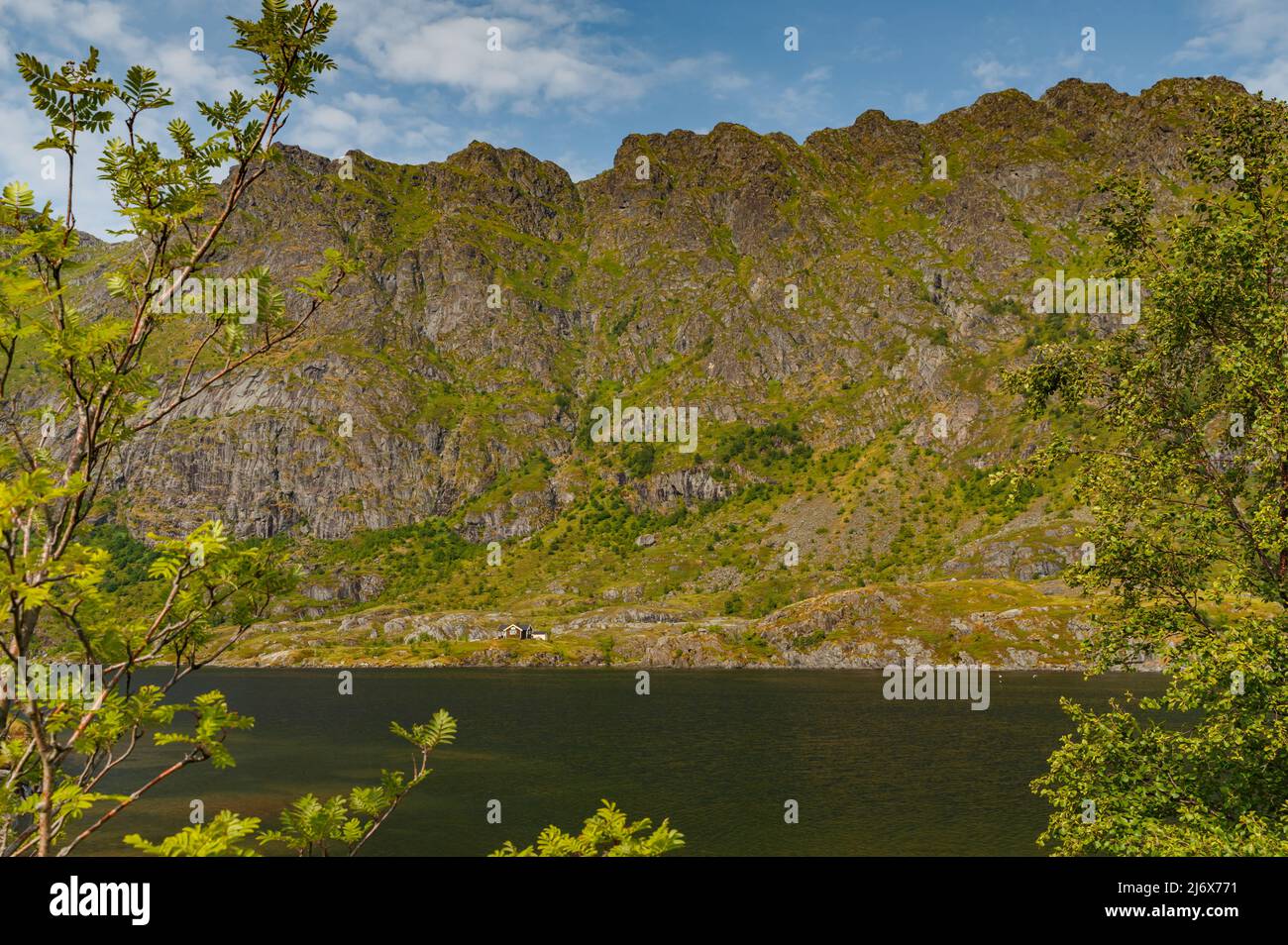 Norwegian seascape, rocky coast with dramatic skies, the sun breaks ...