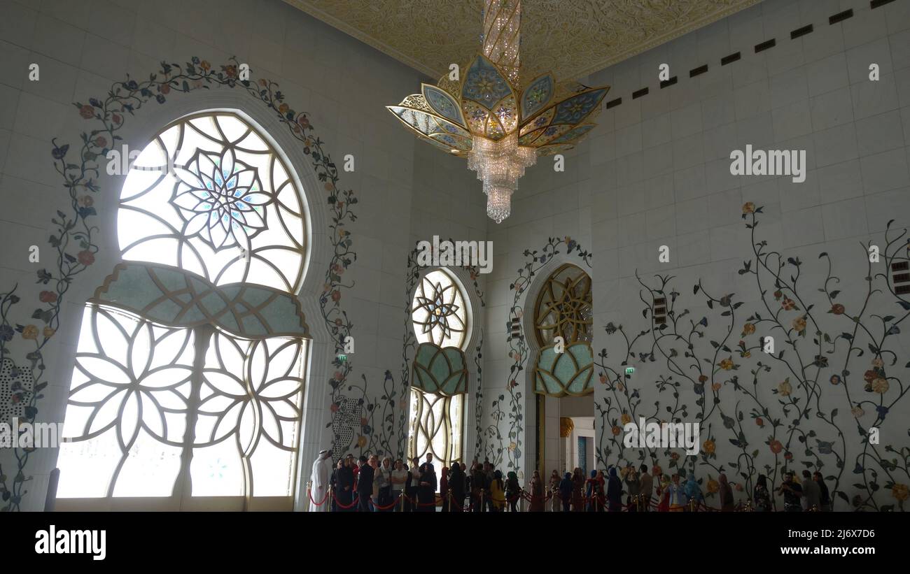 Tourists visiting the Sheikh Zayed Grand Mosque in Abu Dhabi. 2019 ...
