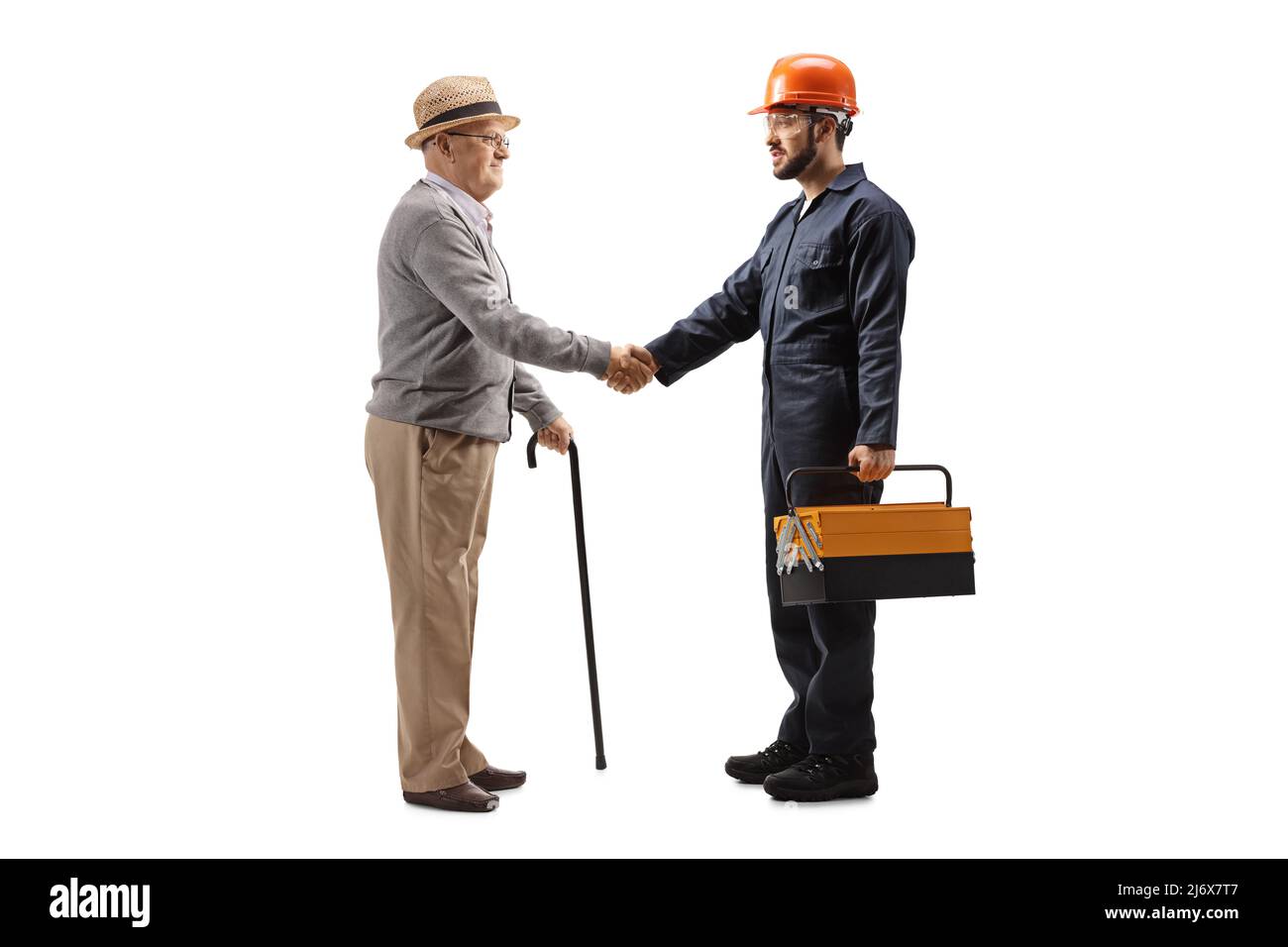 Full length profile shot of a worker in a uniform with a tool box ...