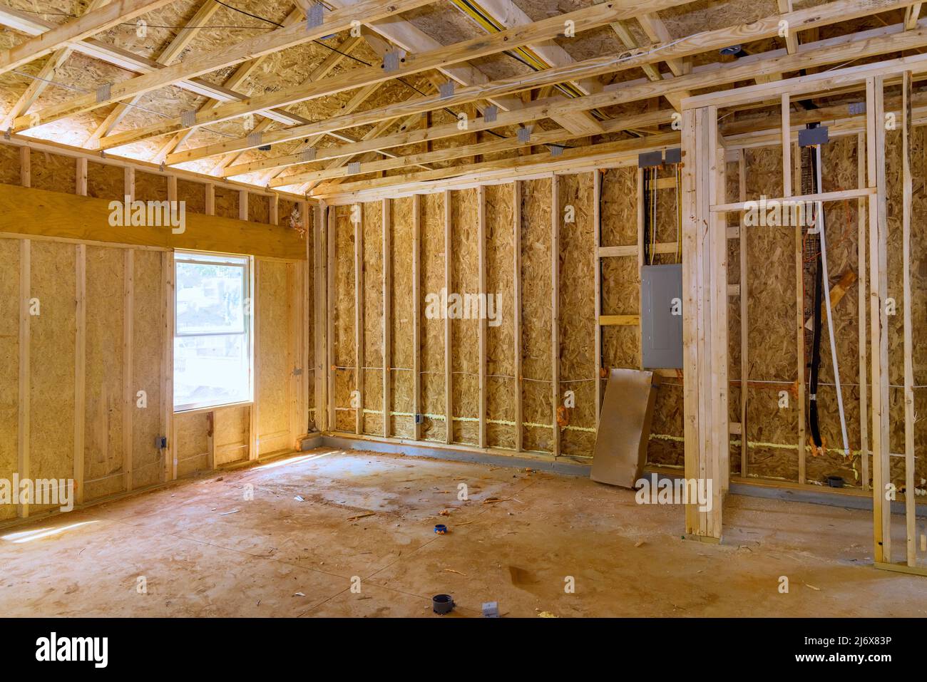New stick built building view framing of beams on new home under ...