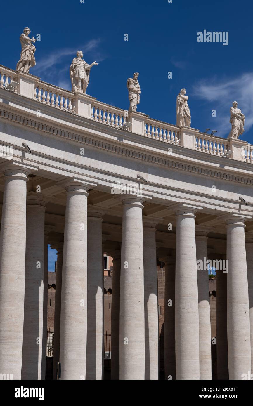 Vatican, St. Peter Square, monumental colonnade with Doric columns and statues of saints on top ...