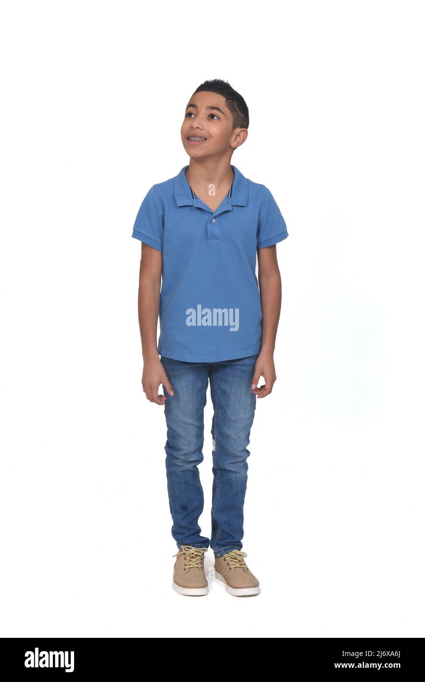 front view of boy looking up on white background Stock Photo - Alamy