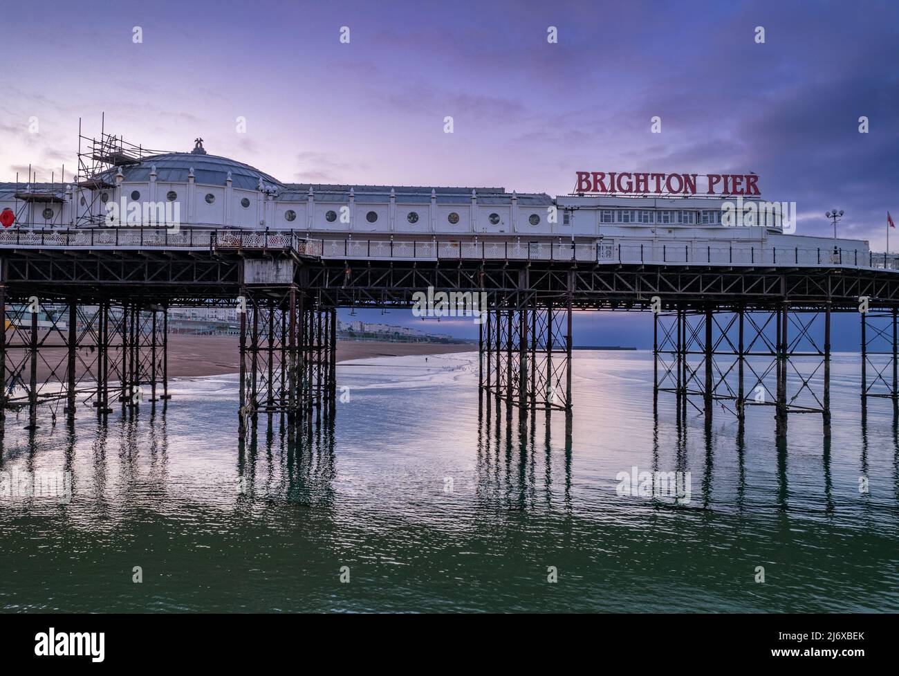 Beautiful drone image of the side of Brighton pier during the morning ...