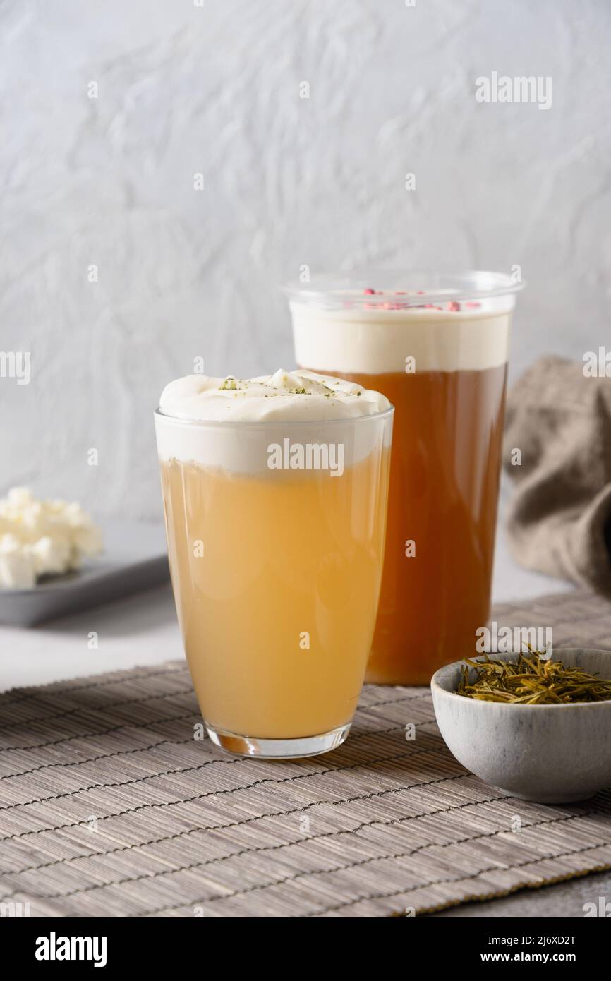 Chinese asian beverage cheese oolong and black tea with layer of cream ...