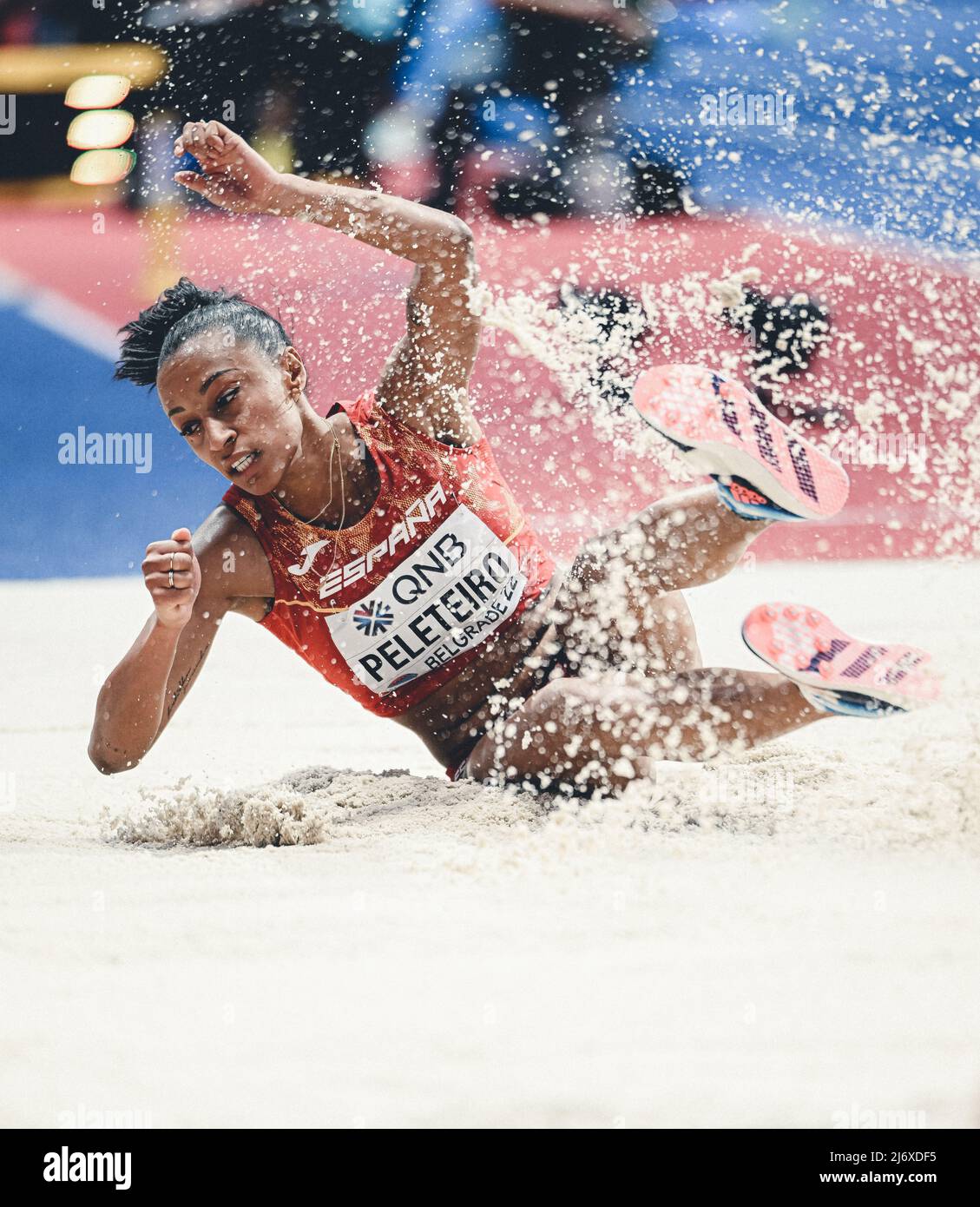 Ana Peleteiro jumping at the Belgrade 2022 Indoor World Championship in ...