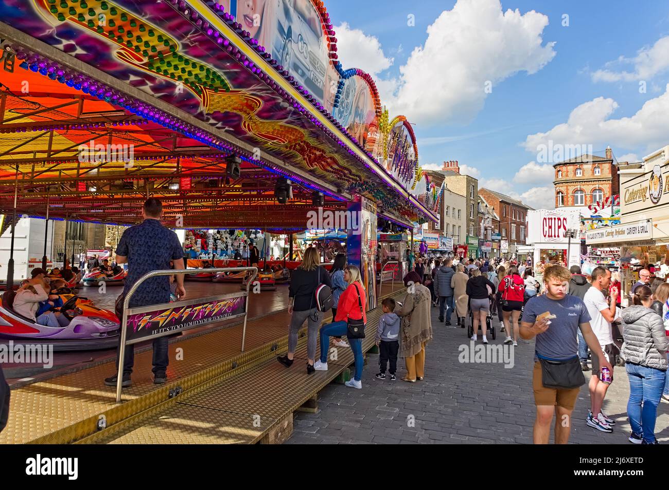 People enjoying the annual May fair in Boston town centre on a sunny ...