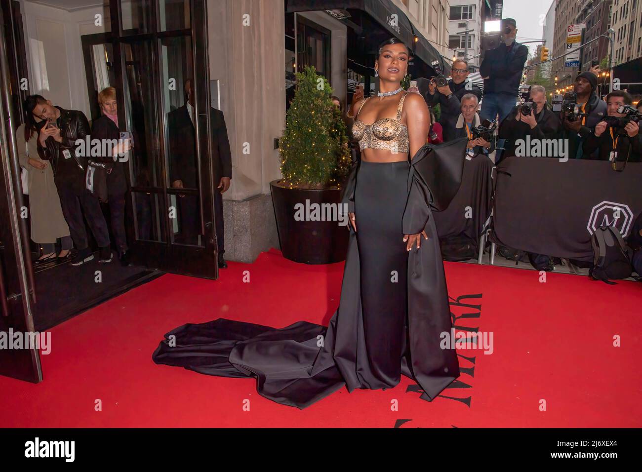 Simone Ashley wearing Moschino departs The Mark Hotel for 2022 Met Gala ...