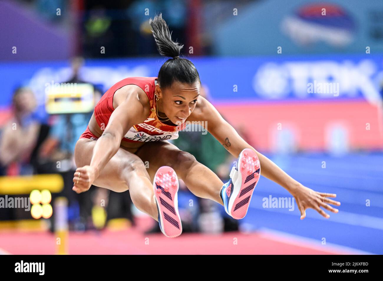 Ana Peleteiro jumping at the Belgrade 2022 Indoor World Championship in ...