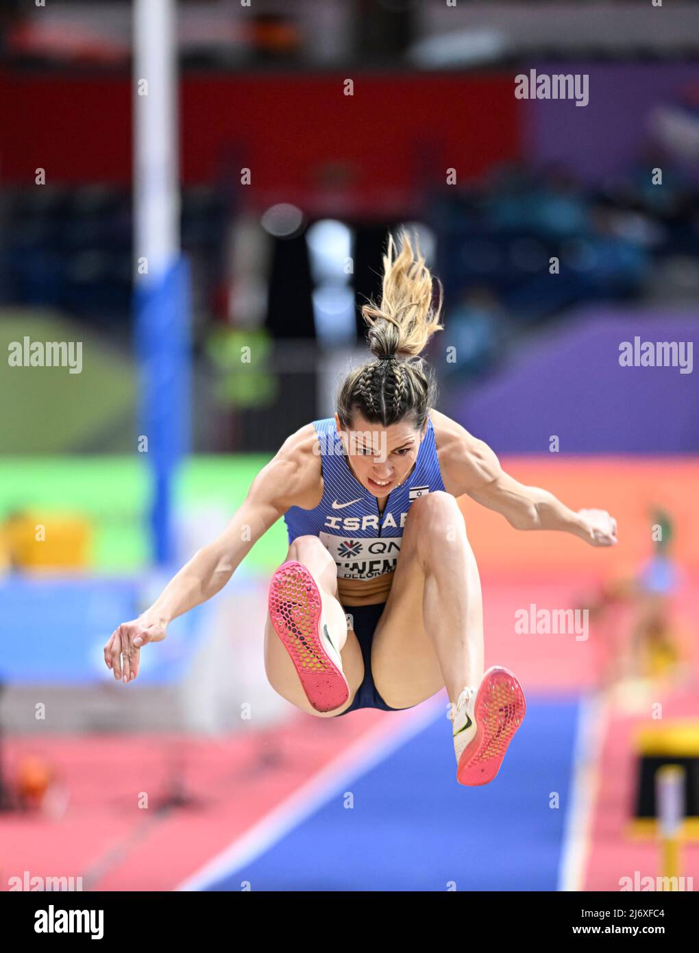 Hanna Minenko jumping at the Belgrade 2022 Indoor World Championship in ...