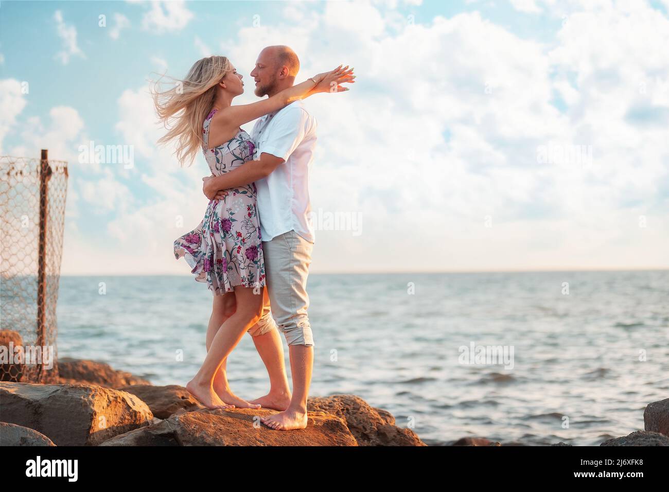 Honeymoon A Young Couple Of Beautiful Woman And Man Are Standing And