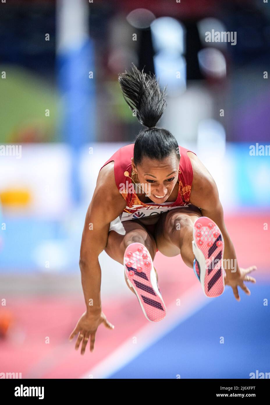 Ana Peleteiro jumping at the Belgrade 2022 Indoor World Championship in ...