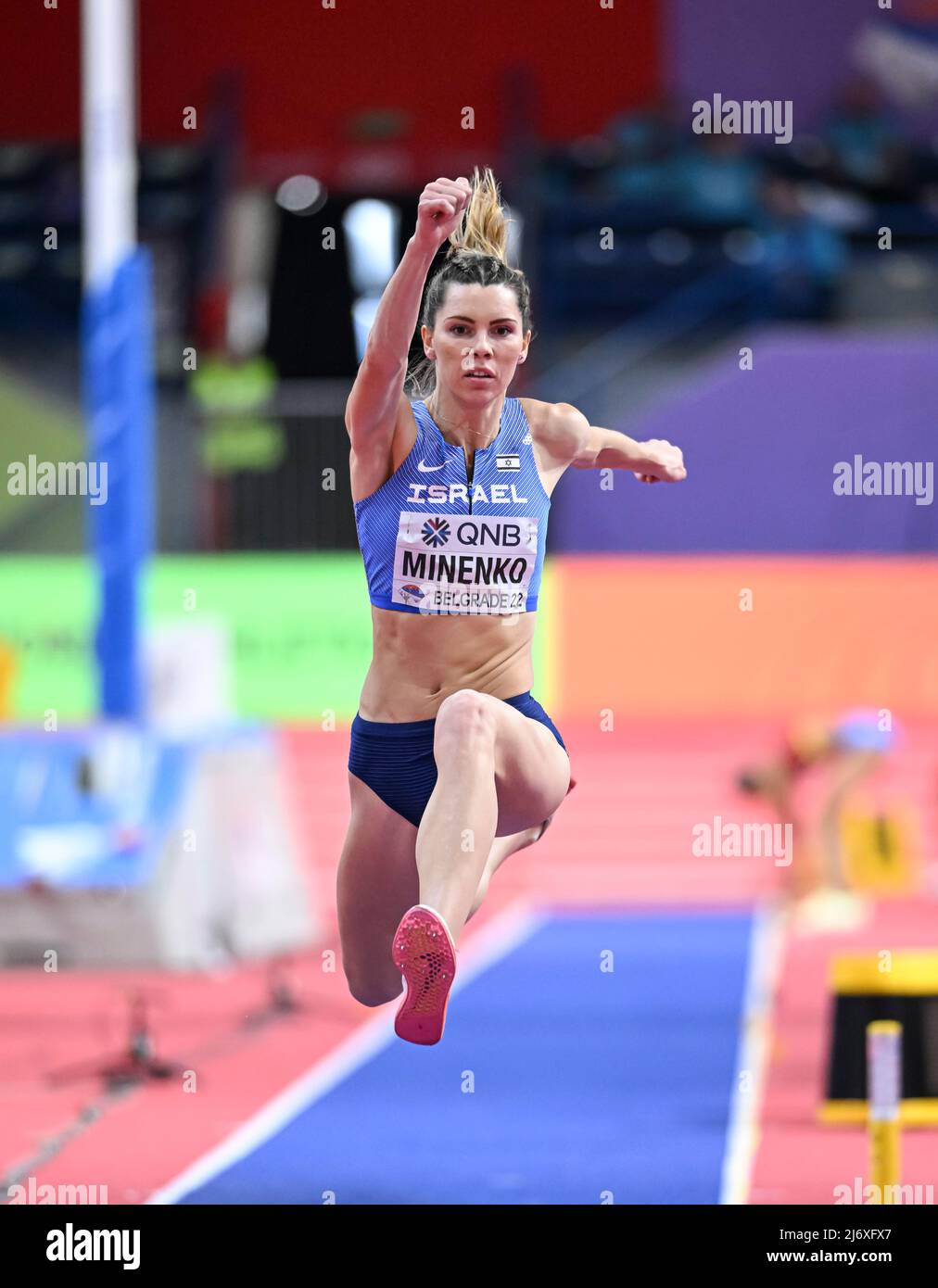 Hanna Minenko jumping at the Belgrade 2022 Indoor World Championship in ...