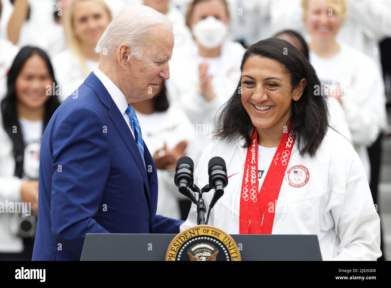 President Joe Biden greets Olympic bobsledder Elana Meyers Taylor while ...