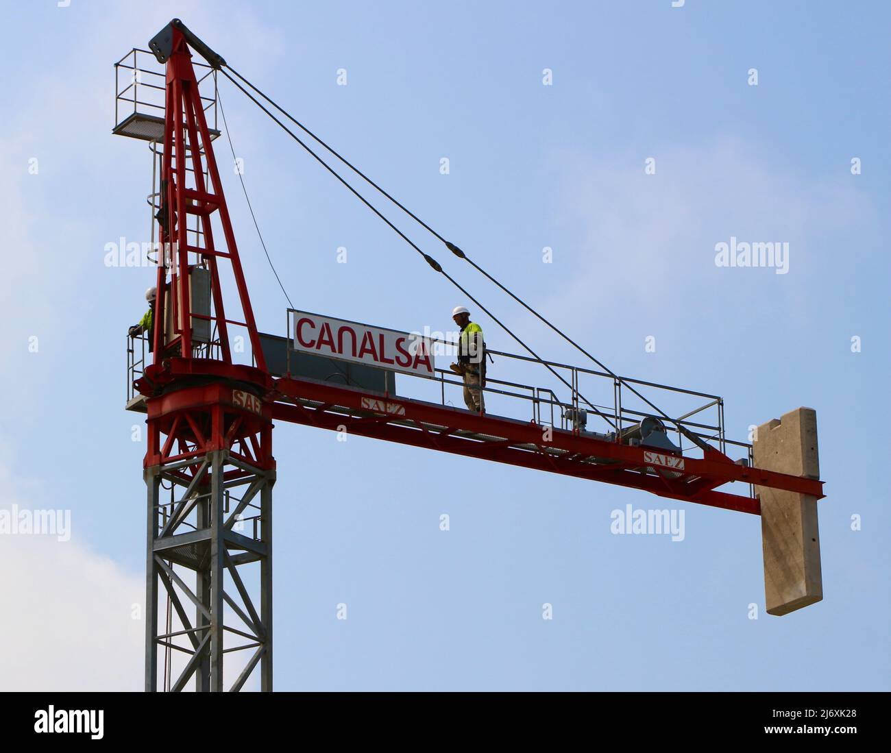 Construction workers assembling a tower crane Santander Cantabria Spain ...
