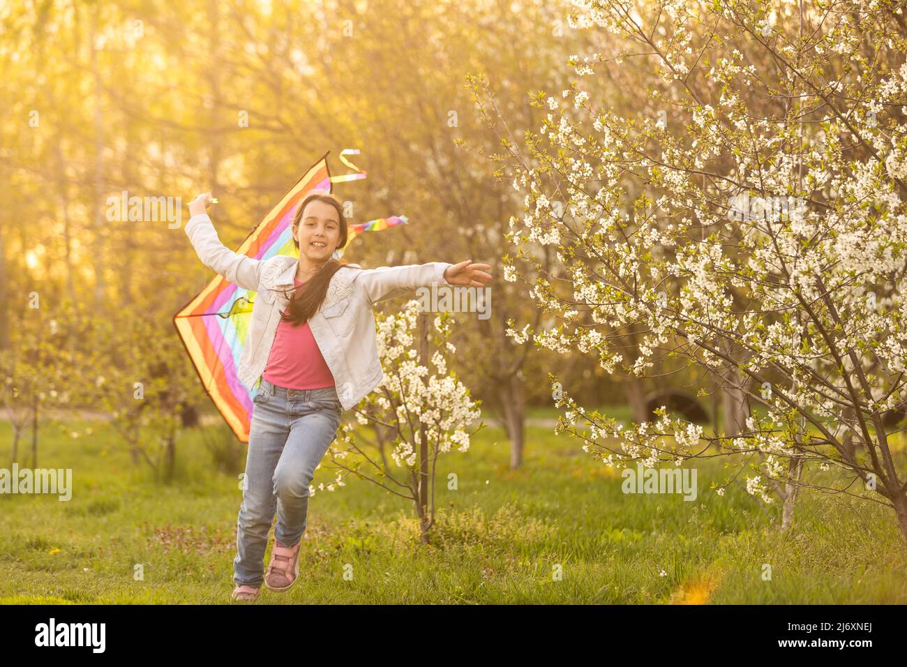little girl with a kite in the spring. Childhood, Children's Day Stock ...