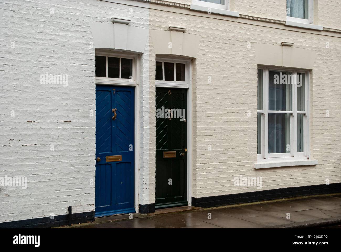 Front house facade with doors and window Stock Photo - Alamy