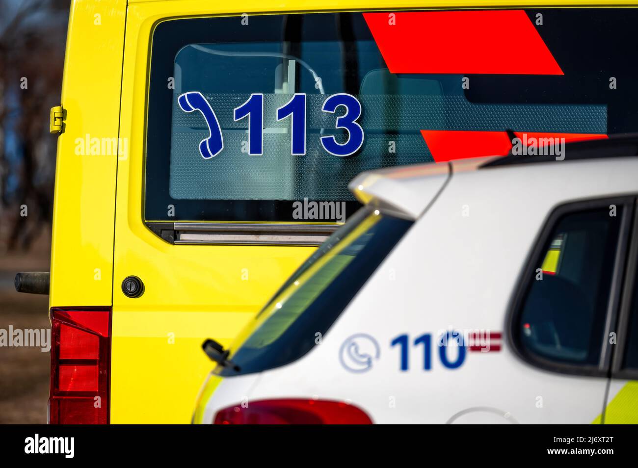 close-up of stencilled police and ambulance cars, 112 and 113 emergency ...