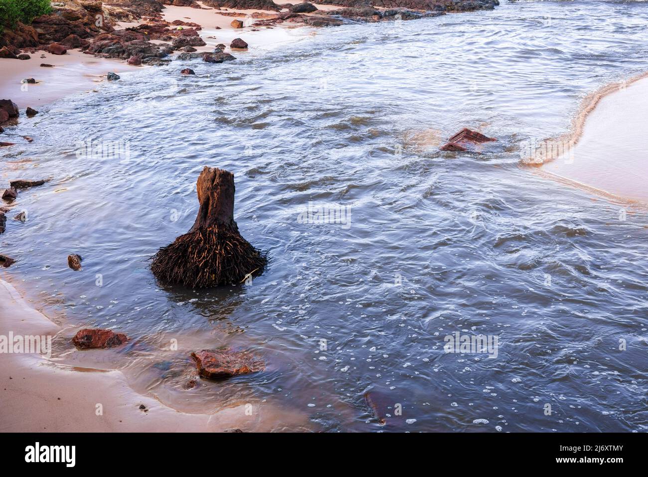 View of the river that flows into Boca do Rio beach in Salvador in the ...