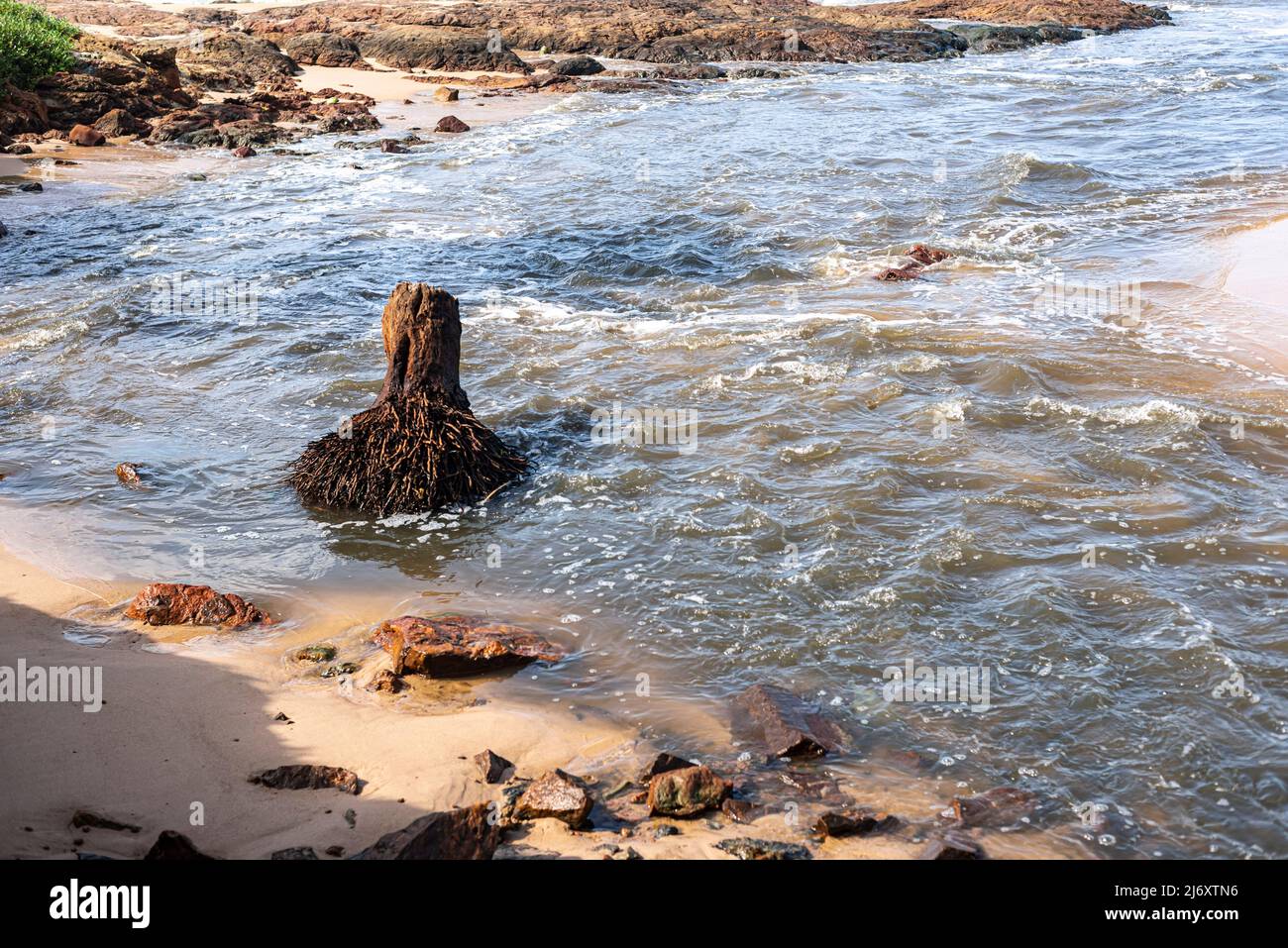 View of the river that flows into Boca do Rio beach in Salvador in the ...